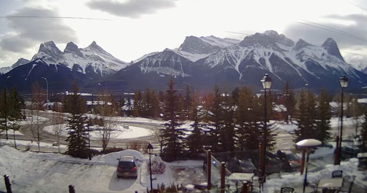 View The Three Sisters Mountain Range From A Bear & Bison LIVE Webcam